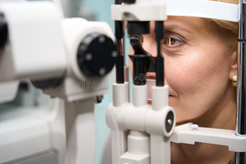 Woman Head is Fixed in Front of Special Ophthalmological Device Stock ...