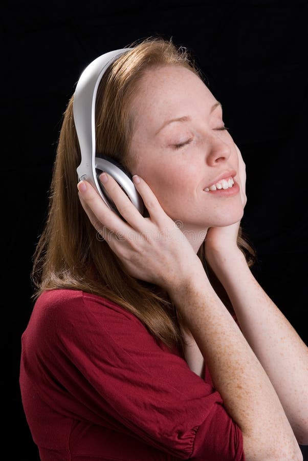 Woman with headphones-01 stock image. Image of horizontal - 12494277