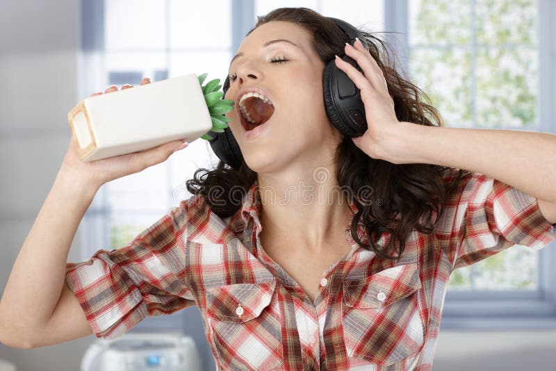 Woman with Headphones and Plant Microphone Stock Image - Image of ...