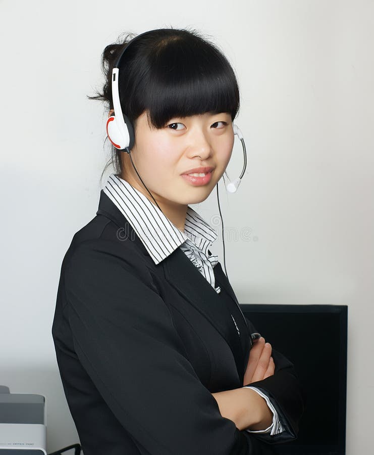 Woman with a headset. stock image. Image of asian, background - 22084767