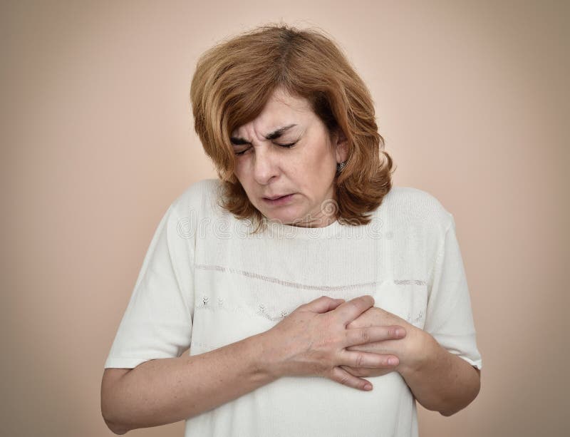 Woman with heart attack stock photo. Image of health - 105595212