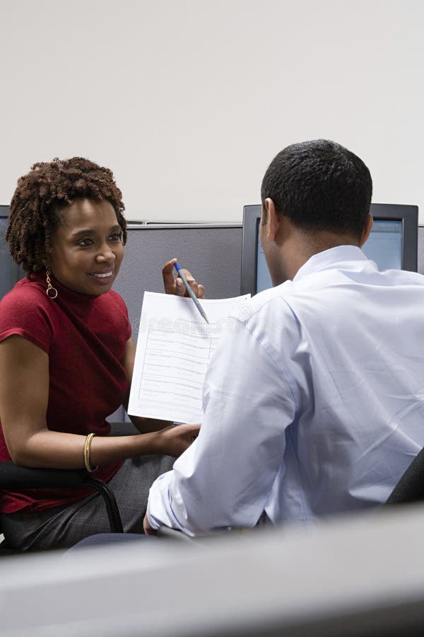 Woman Helping Colleague with Form Stock Photo - Image of formal ...
