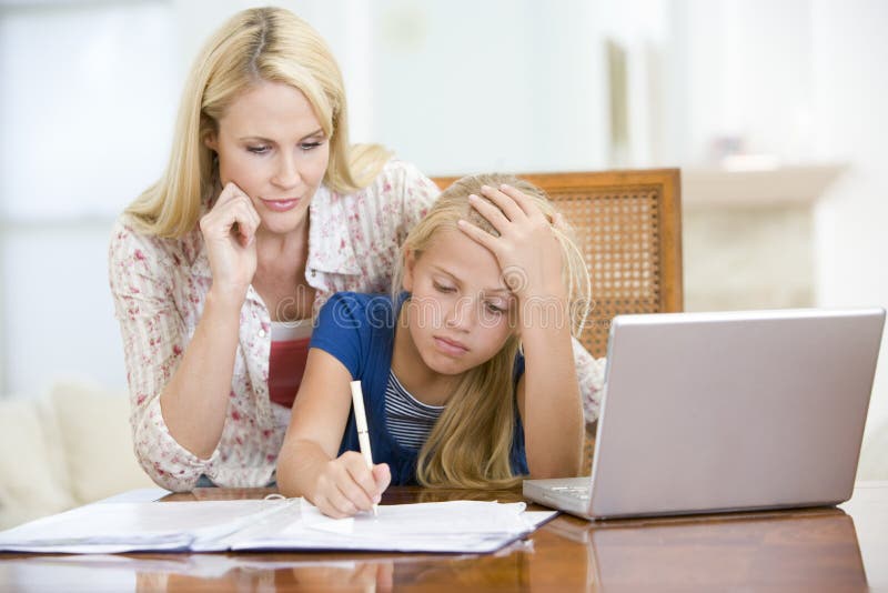 Man Helping Young Boy in Kitchen Doing Homework an Stock Photo - Image ...