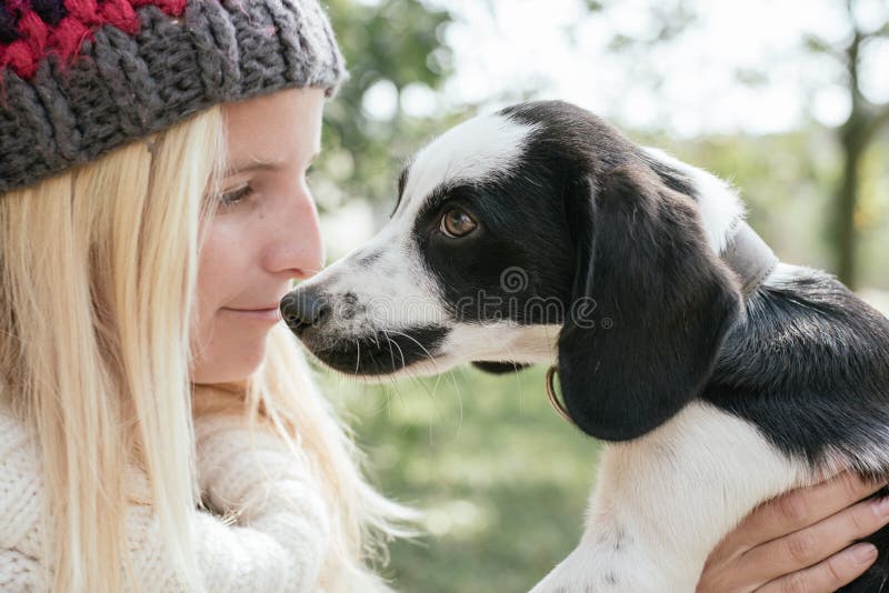 Woman and her dog stock photo. Image of posing, emotional - 77979292