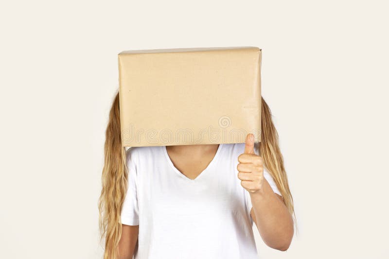 Woman with Her Head in a Box, Smile Gesture and Thumb Up Gesture ...