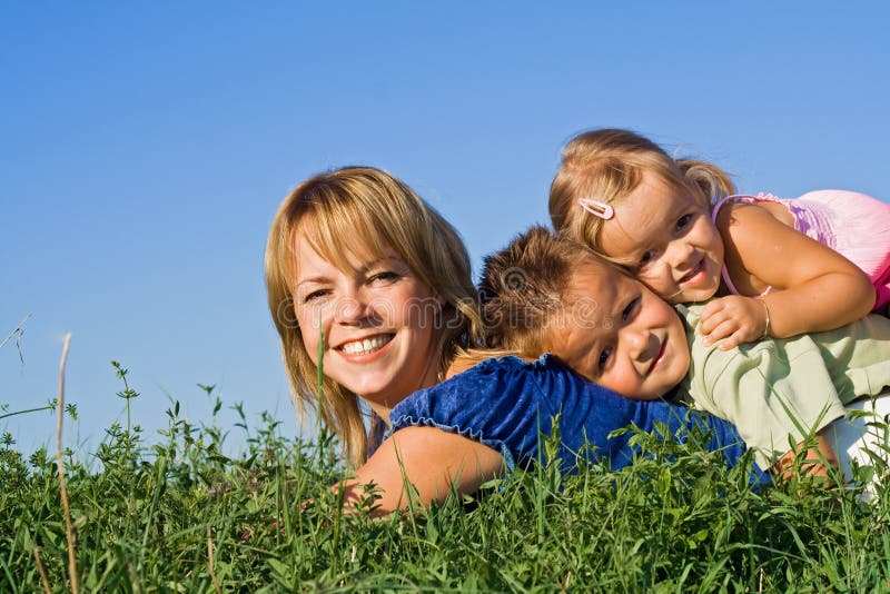 Woman and Her Kids Playing Outdoors Stock Image - Image of meadow ...