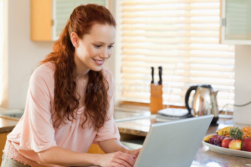 Woman with Her Laptop in the Kitchen Stock Image - Image of kitchen ...