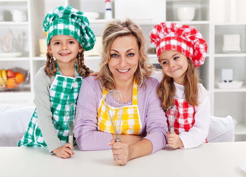 Woman and Her Little Helper Chefs Stock Photo - Image of home, food ...