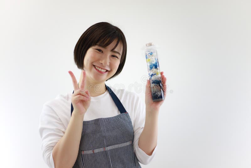 Woman with ramune stock photo. Image of lifestyle, eating - 243903202