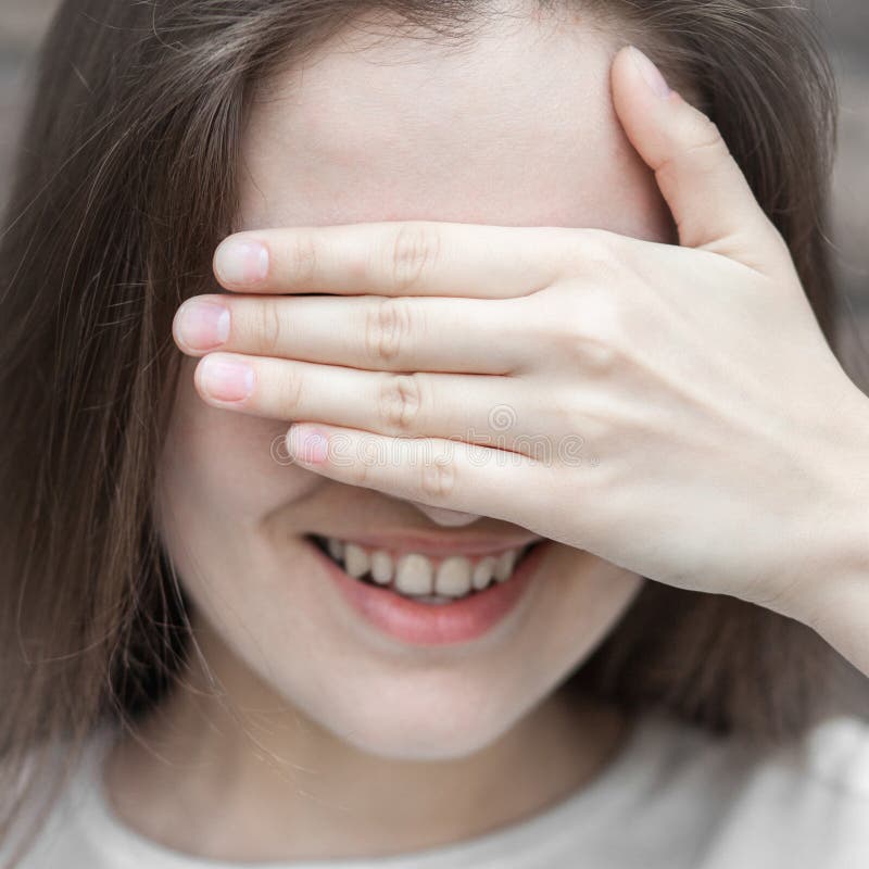 Woman hides her face palm stock image. Image of girls - 37542969