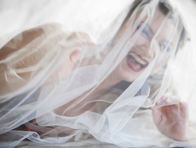 Woman hiding and laughing stock photo. Image of fashion - 45849690