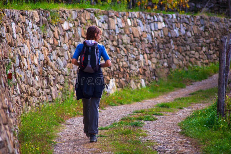 Woman hiker with backpack stock image. Image of peak - 173931449