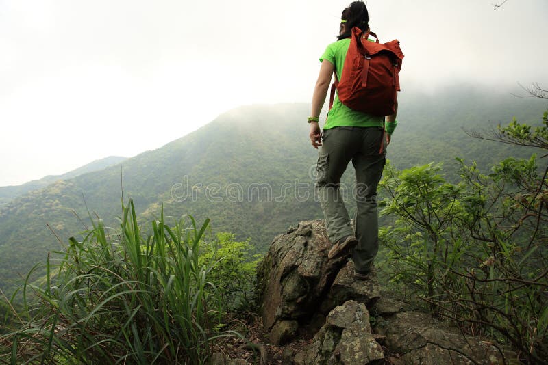 Woman Hiker Hiking at Spring Mountain Peak Stock Photo - Image of mist ...