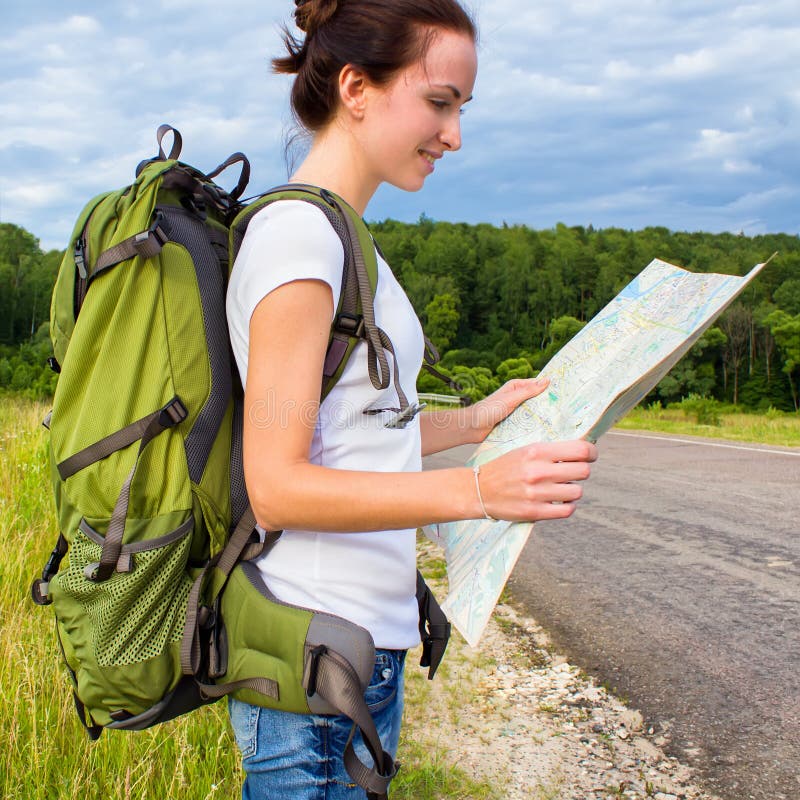 Woman hiker reading map stock photo. Image of lost, navigation - 50081530