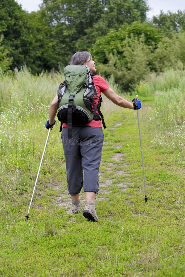 Woman hiking stock photo. Image of grass, green, adventure - 43056168