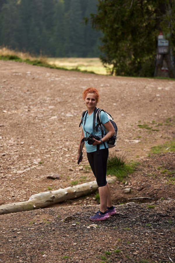 Woman Hiking on a Trail in the Mountains Stock Photo - Image of tourist ...