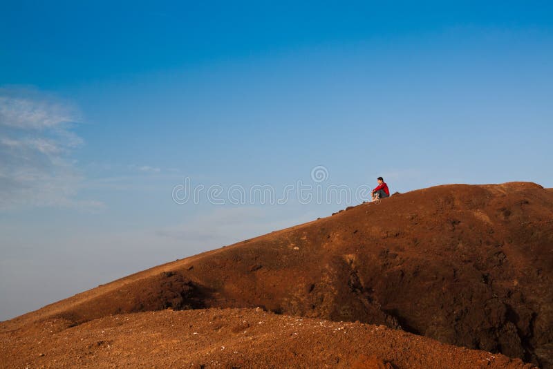 Woman on a Hill Looking Down Stock Image - Image of person, sunbathing ...