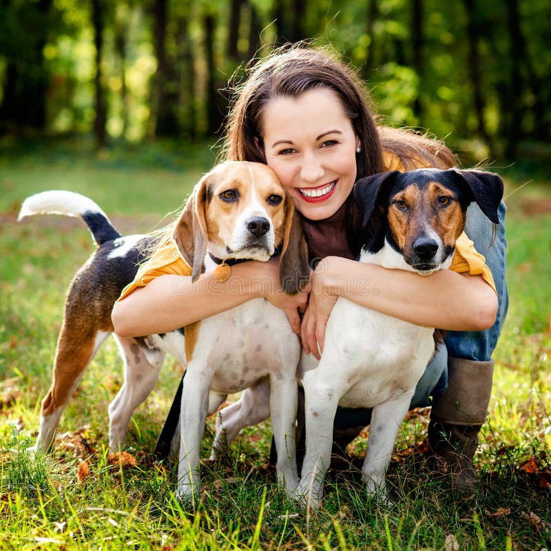 Woman and his dogs stock image. Image of outdoor, happy - 26820149