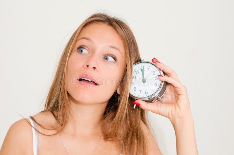 Woman checking the time stock image. Image of reminder - 23108505