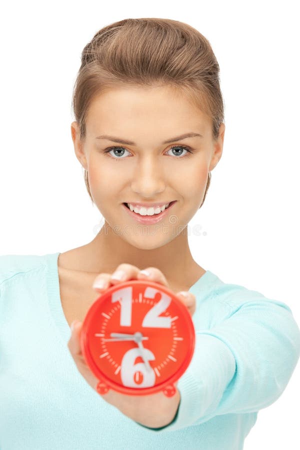 Woman holding alarm clock stock photo. Image of alarm - 40166486