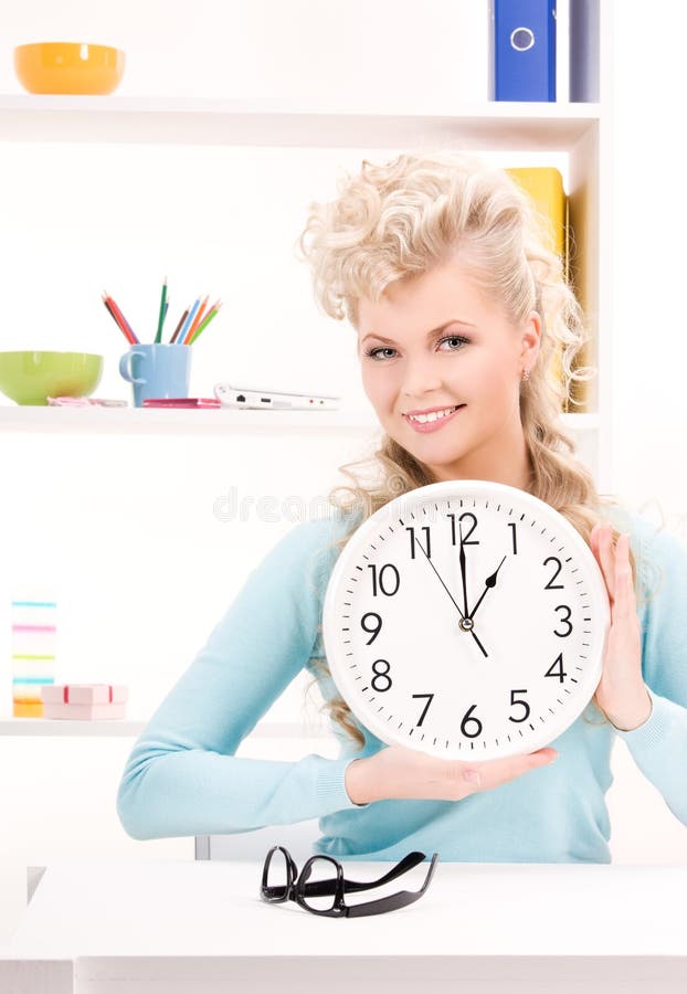 Woman holding big clock stock image. Image of employee - 40848791