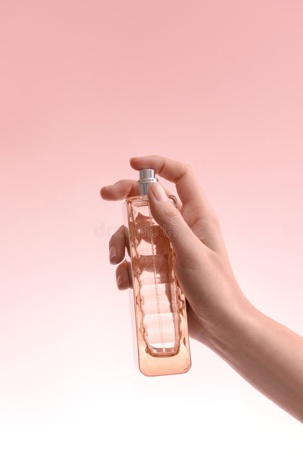 Female Hand Holding Perfume Bottle Stock Photo - Image of beauty ... Female Hand Holding Perfume Bottle Stock Photo - Image of beauty ...