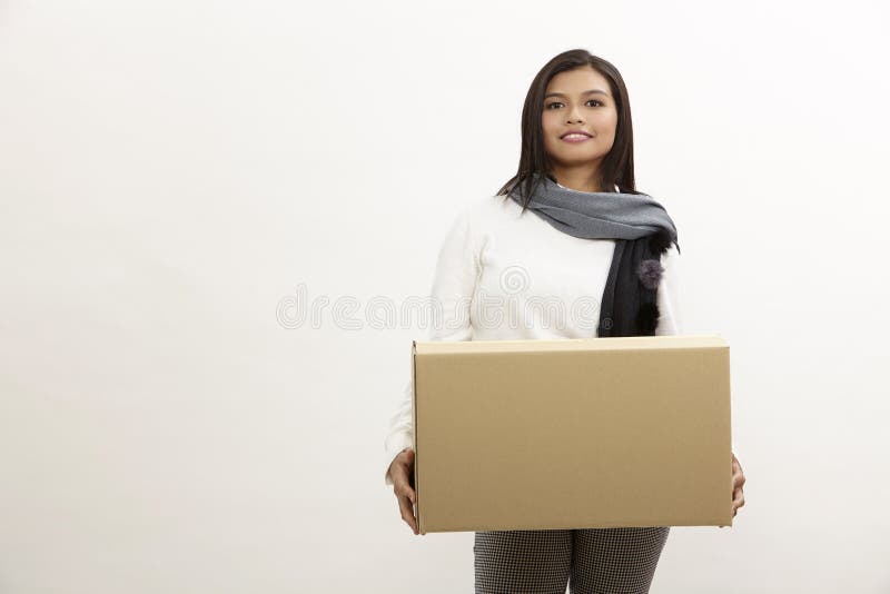 Woman holding a box stock image. Image of female, happy - 105790391