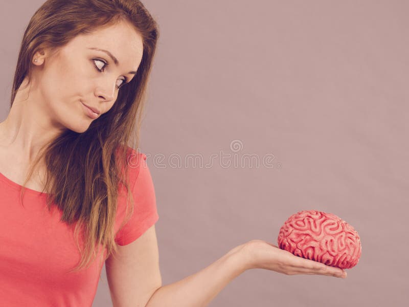 Woman Holding Brain Thinking Stock Image - Image of understanding ...