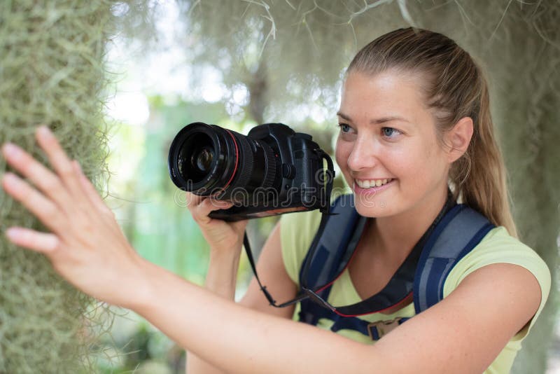 Woman Holding Camera and Looking for Composition Stock Image - Image of ...