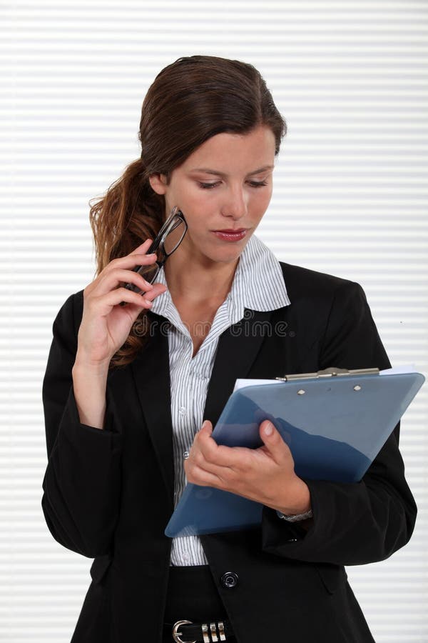Woman holding clipboard stock image. Image of document - 30482561