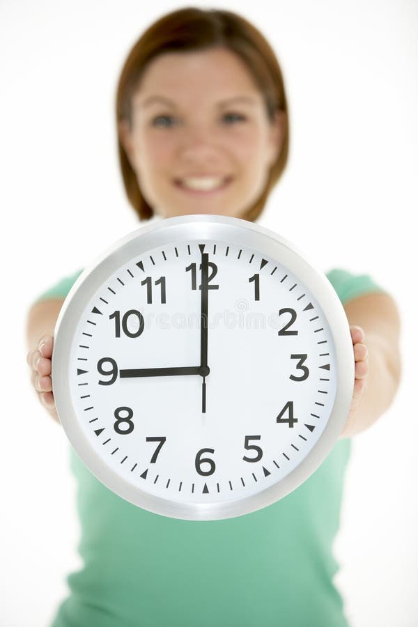 Woman Holding Clock Showing 9 O Clock Stock Image - Image of people ...