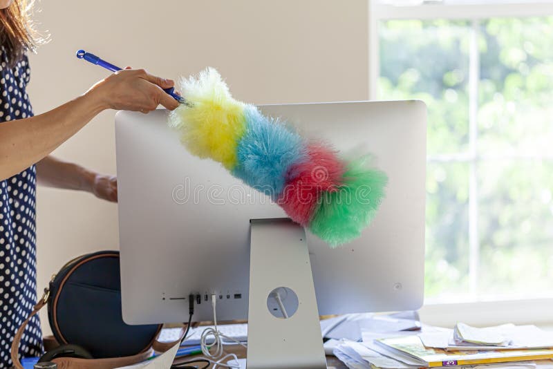 A Woman Holding Colorful, Non Scratch Plush Microfiber Duster Brush is ...