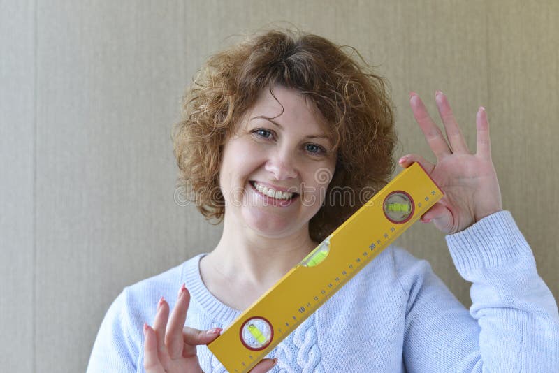 Woman is Holding Construction Tools Stock Image - Image of hold ...