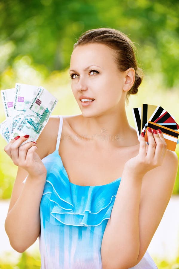 Woman Holding Credit Cards and Cash Stock Image - Image of caucasian ... Woman Holding Credit Cards and Cash Stock Image - Image of caucasian ...