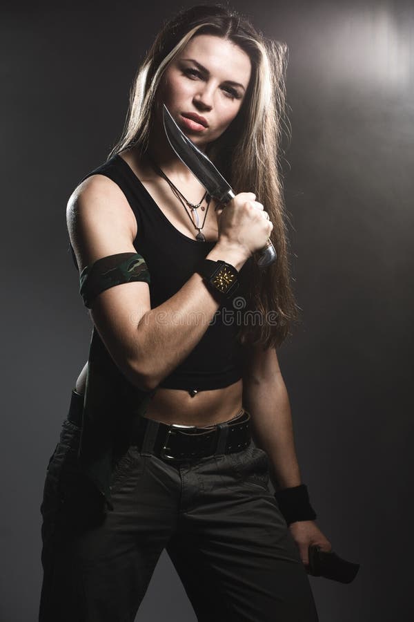 Woman Holding Daggers Stock Photos - Free & Royalty-Free Stock Photos ...