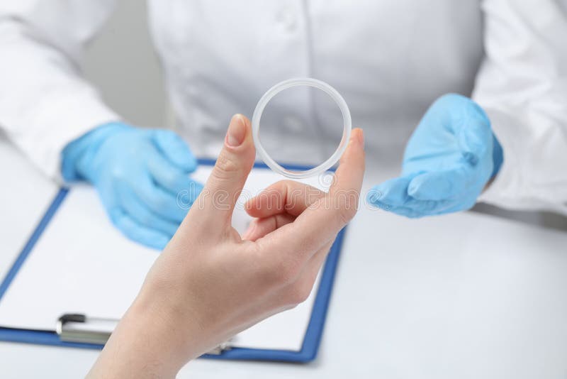 Woman Holding Diaphragm Vaginal Contraceptive Ring At The Doctor S