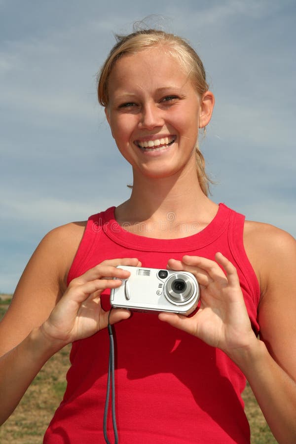 Woman Holding Digital Camera Stock Image - Image of summertime, woman ...