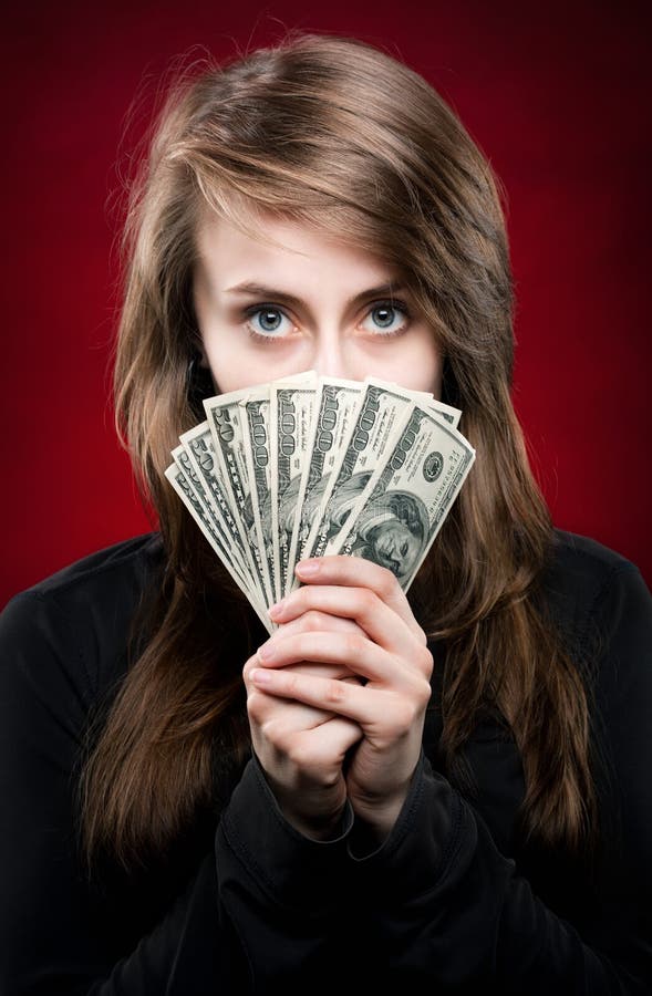 Woman holding fan of money stock image. Image of caucasian - 24824965