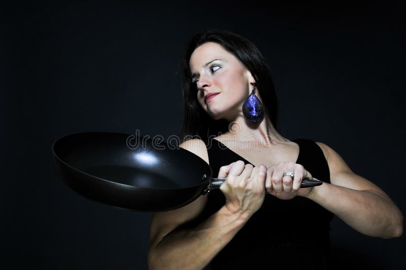 Woman Holding Frying Pan stock image. Image of lady, empowering - 14621727
