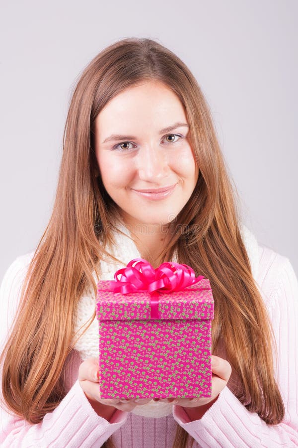 Woman holding gift stock photo. Image of christmas, gift - 34297568