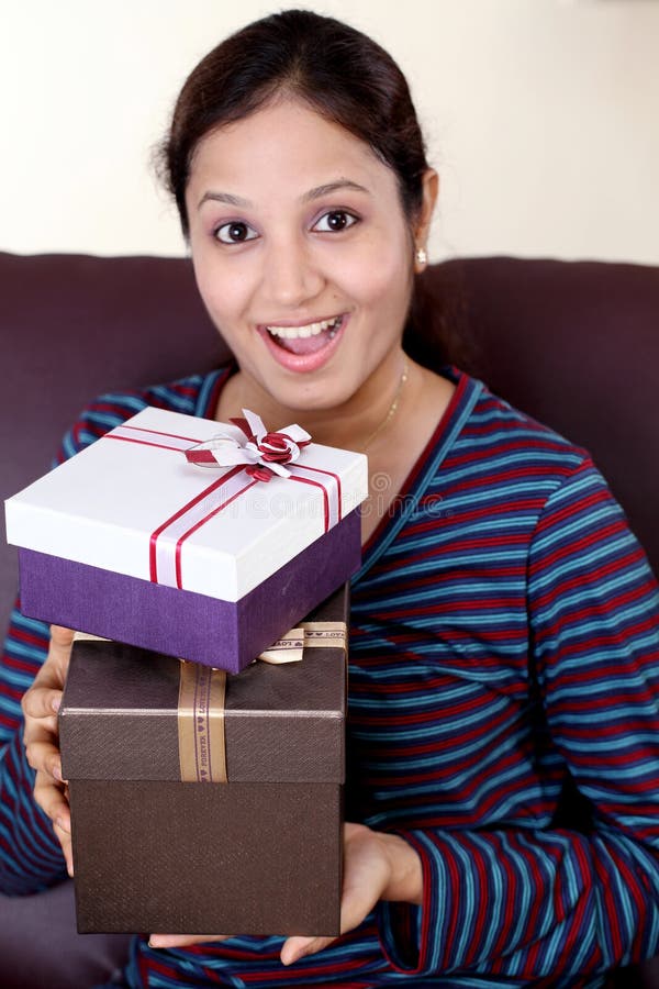 Woman holding a gift box stock photo. Image of happy - 24722946