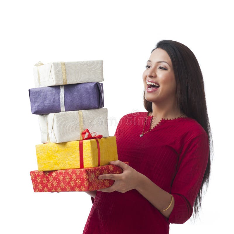 Woman holding gift boxes stock photo. Image of closeup - 36388016