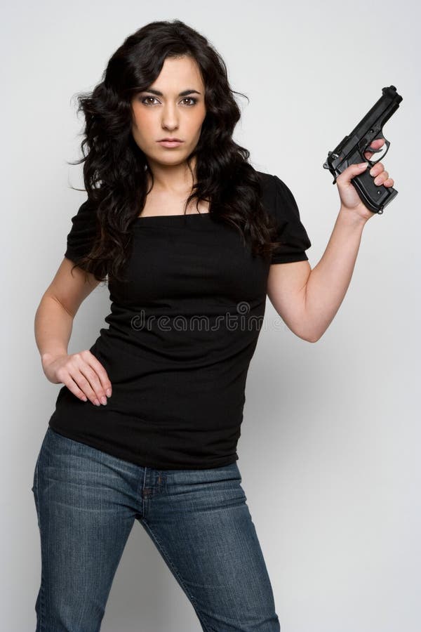 Woman Holding Gun stock photo. Image of posing, pretty - 7708430