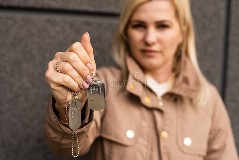 Woman Holding in Hand Military Token Stock Image - Image of barbed ...