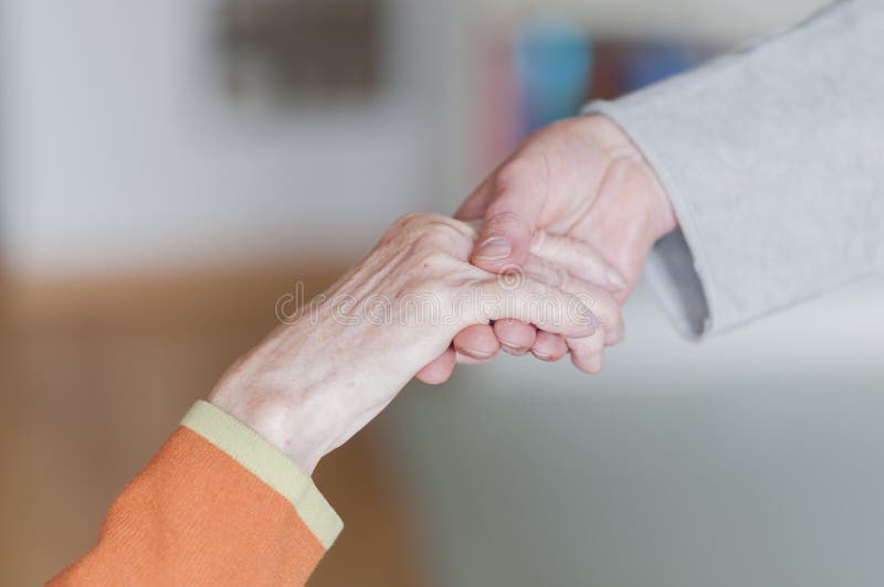 Woman Holding Hand of a Senior Citizen Stock Photo - Image of adult ...