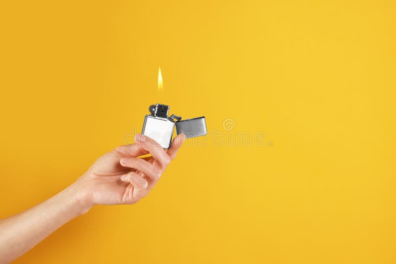 Woman Holding Lighter with Burning Flame on Orange Background, Closeup ...