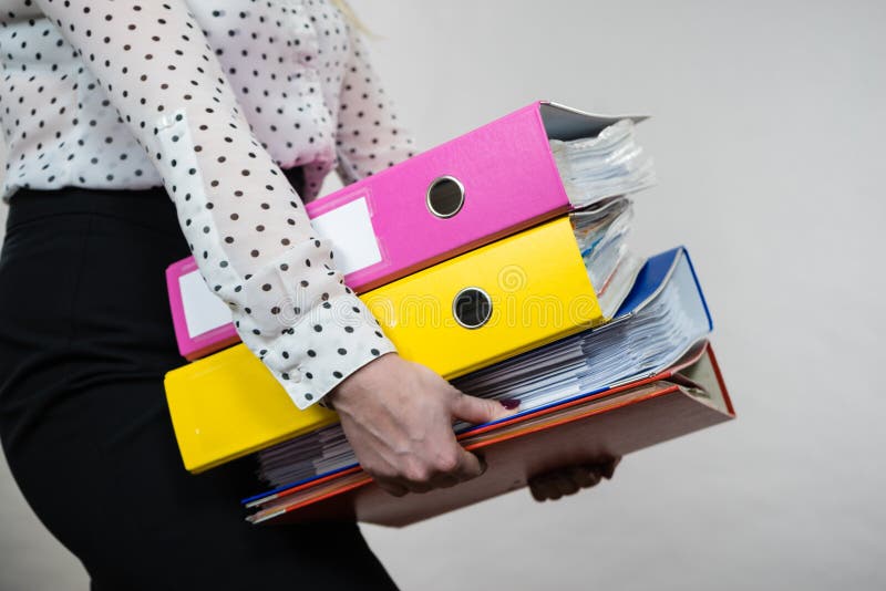 Woman Carrying Heavy Files Stock Photos - Download 76 Royalty Free Photos