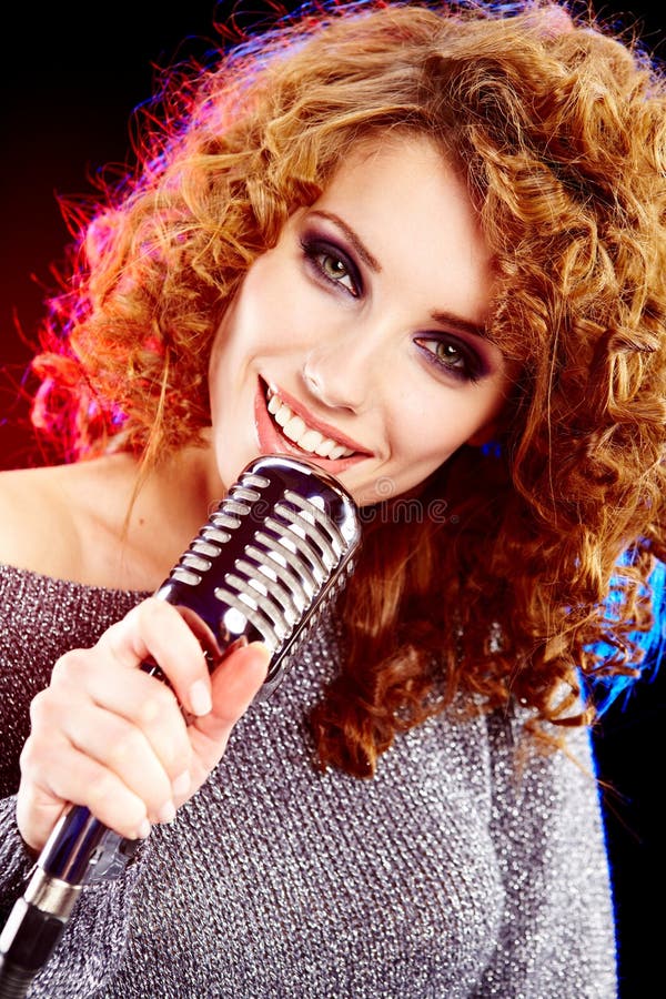 Woman holding microphone stock photo. Image of girl, portrait - 25572580