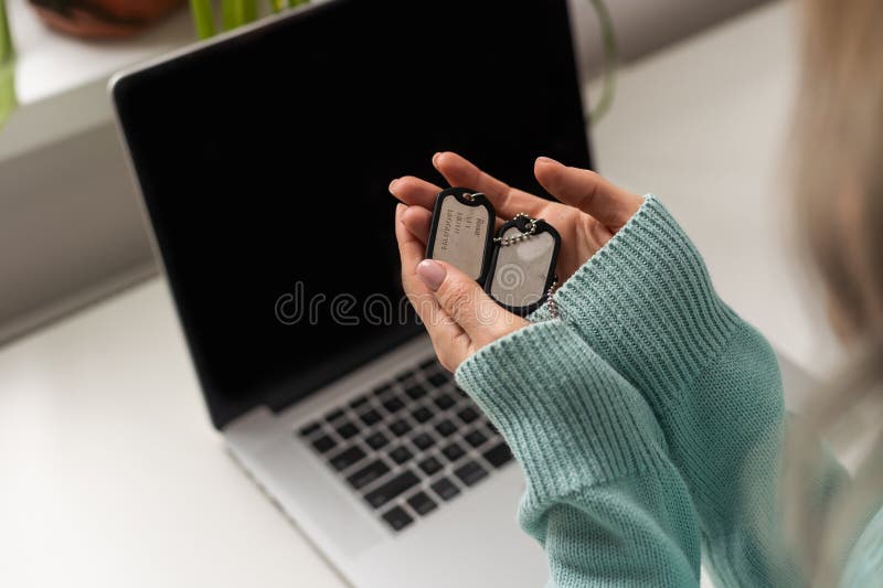 Woman Holding Military Token in Hand Stock Photo - Image of caucasian ...