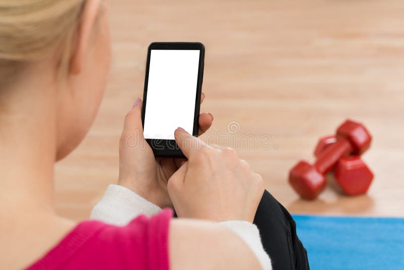 Woman Holding Mobile Phone stock image. Image of holding - 56847743